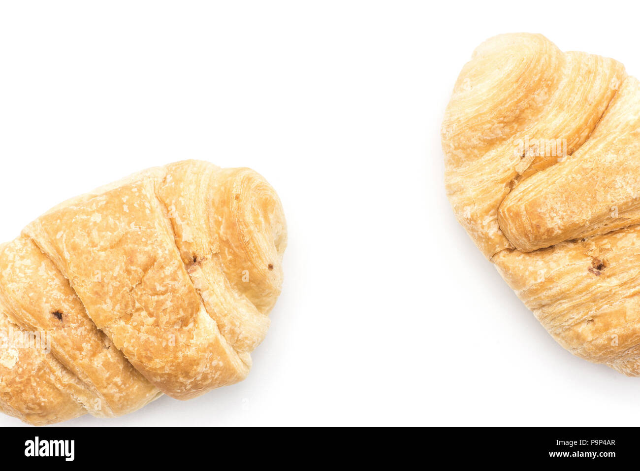 Two croissants or cornetto background isolated on white (top view Stock ...