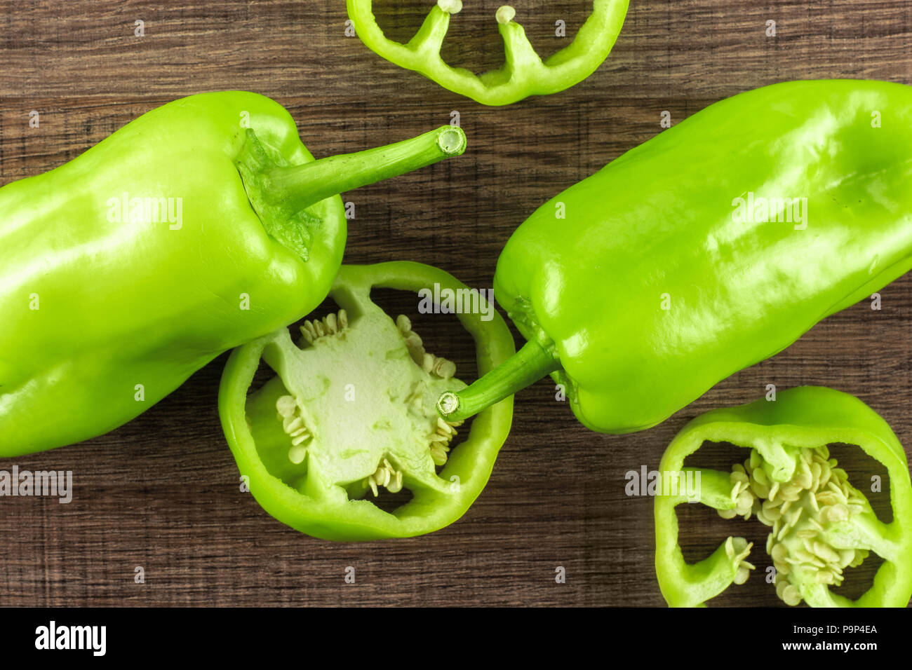 Group of two whole three slices of light green bell pepper flatlay ...