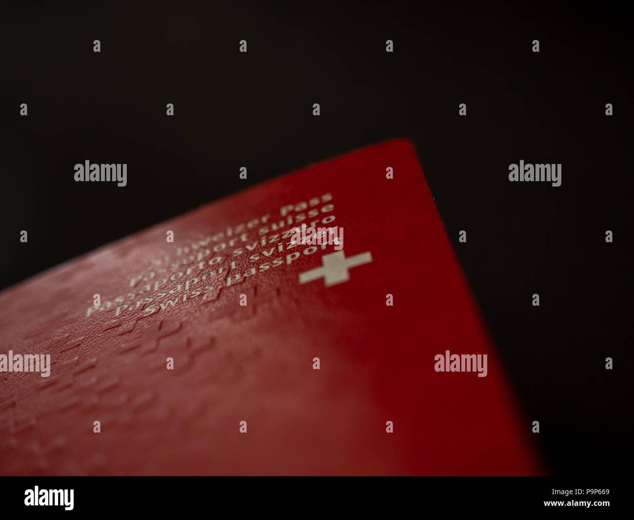swiss passport close up on black background isolated switzerland ...