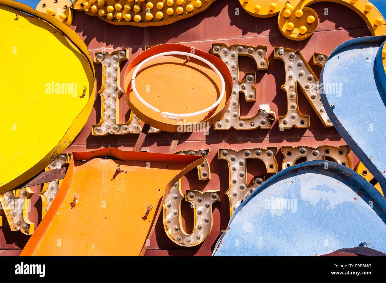 Close-up details of old signs with vintage light bulbs, metal letters ...