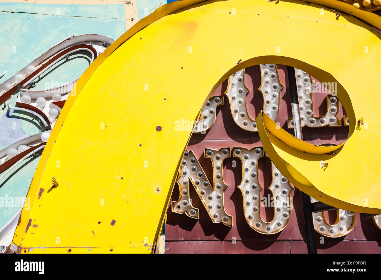 Close-up details of old signs with vintage light bulbs, metal letters ...