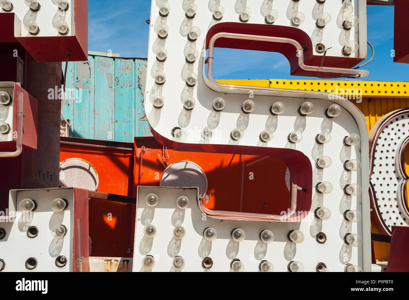 Close-up details of old signs with vintage light bulbs, metal letters ...