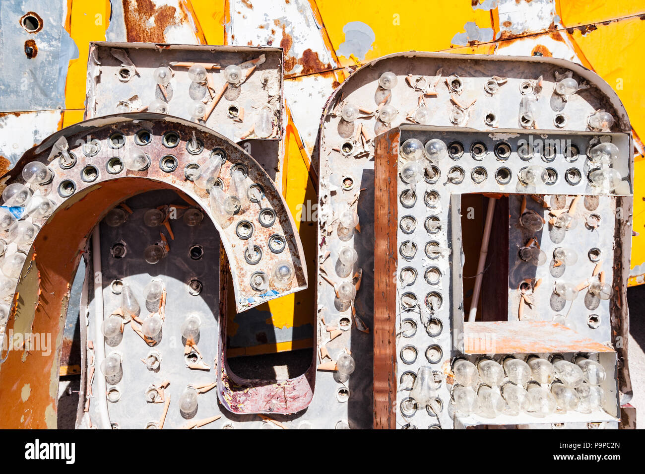 Close-up details of old signs with vintage light bulbs, metal letters ...