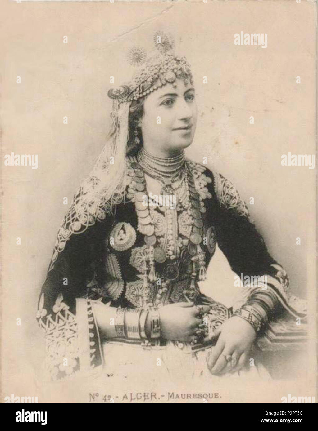 . English: A woman from Algiers (Algeria), wearing the 'Karakou', c ...