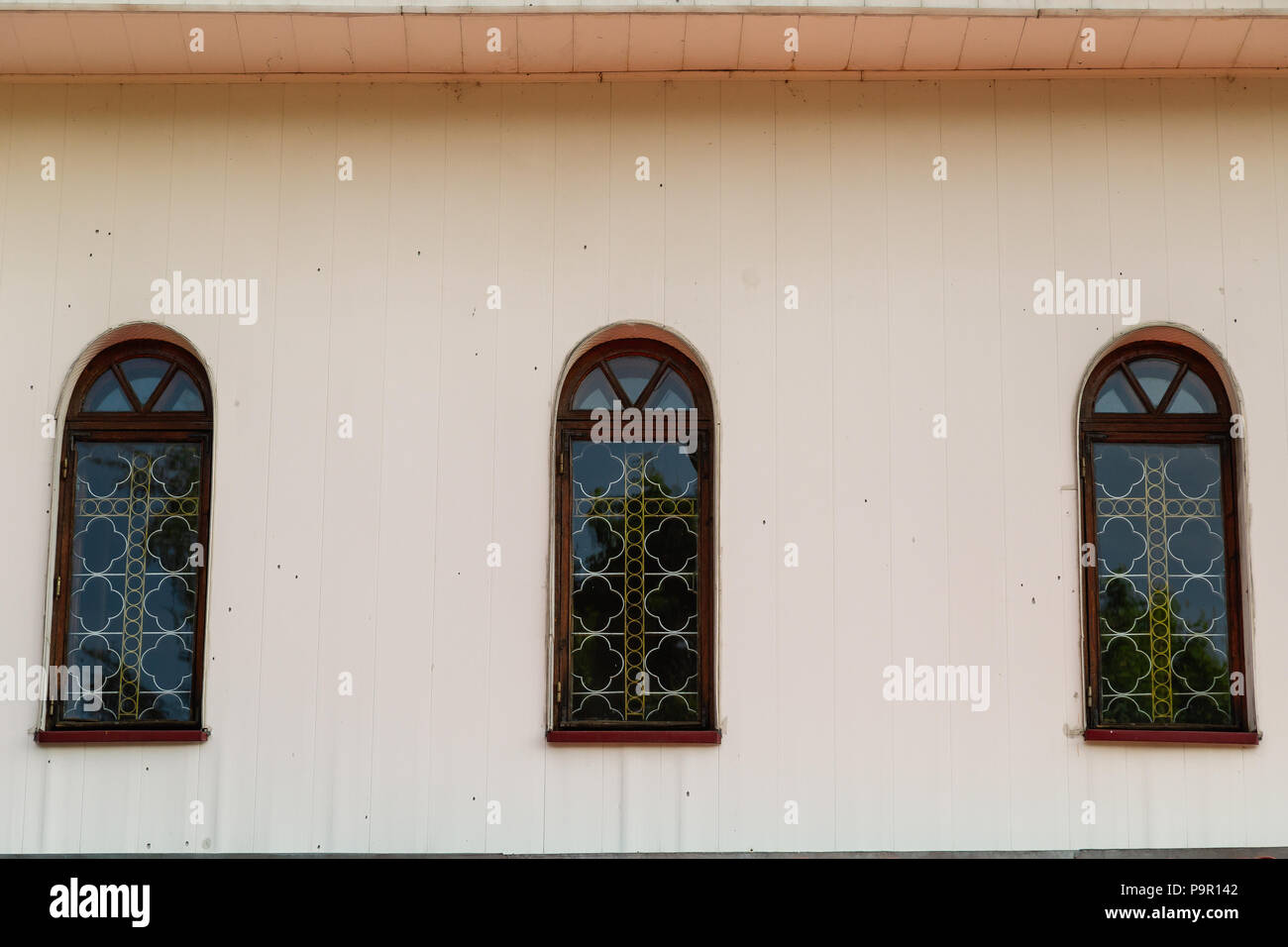 Three windows on the wall, the texture of the window background Stock ...