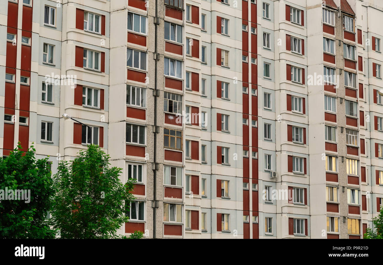 Windows in a panel house with a balcony Stock Photo - Alamy