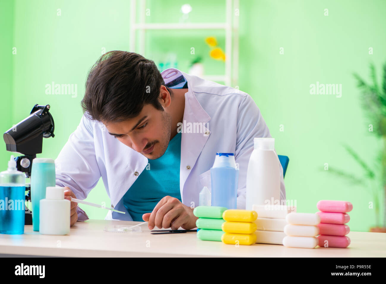 Chemist testing soap in the lab Stock Photo - Alamy