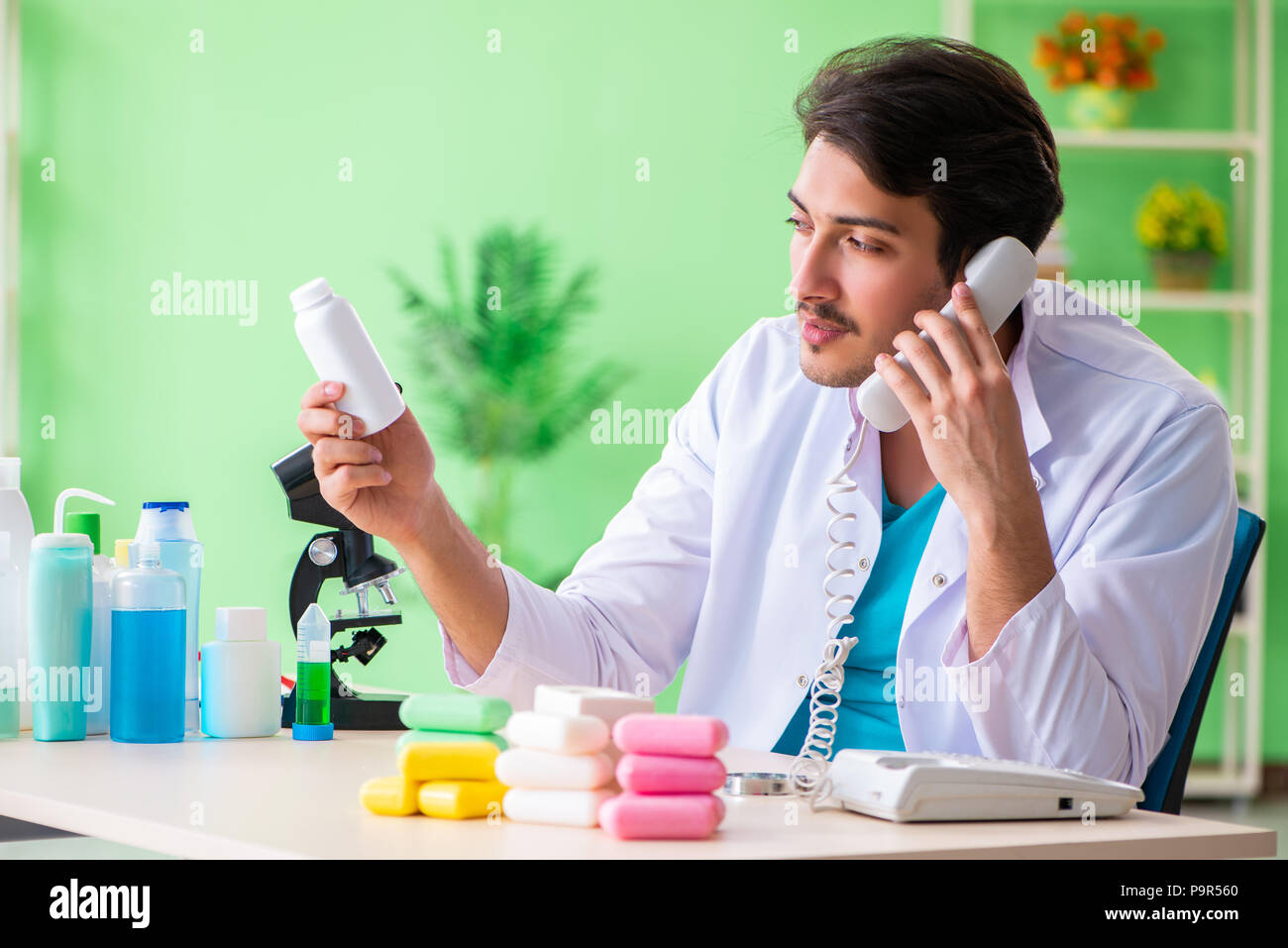 Chemist testing soap in the lab Stock Photo - Alamy
