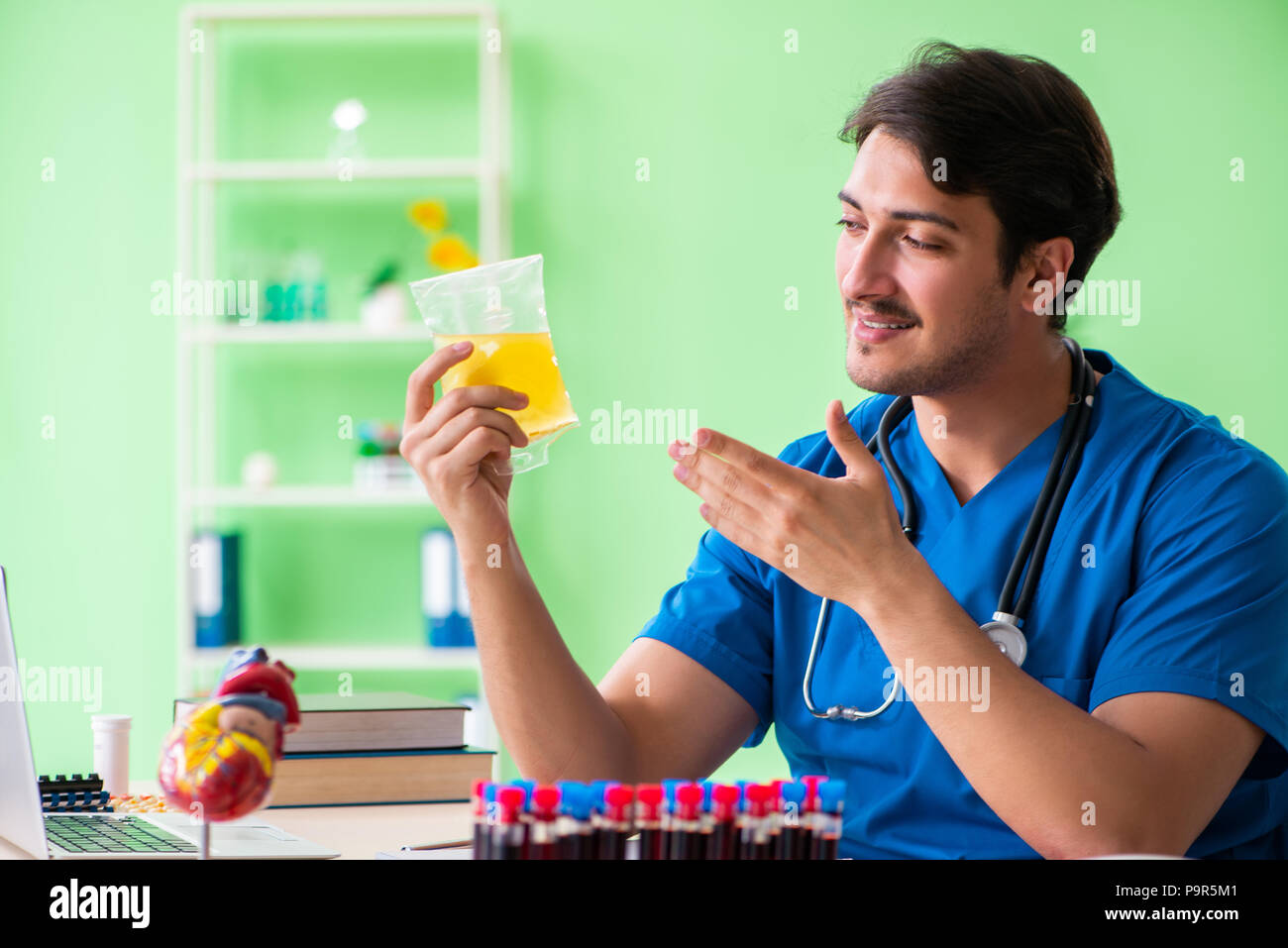 Doctor doing blood analysis in the lab Stock Photo - Alamy