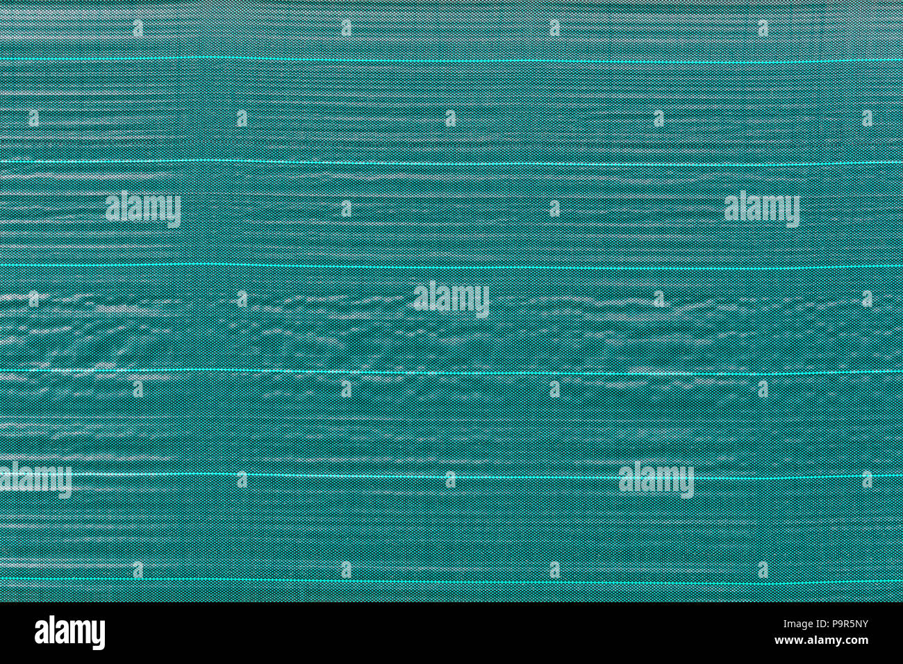 green protective building cloth texture. safety mesh on building under ...