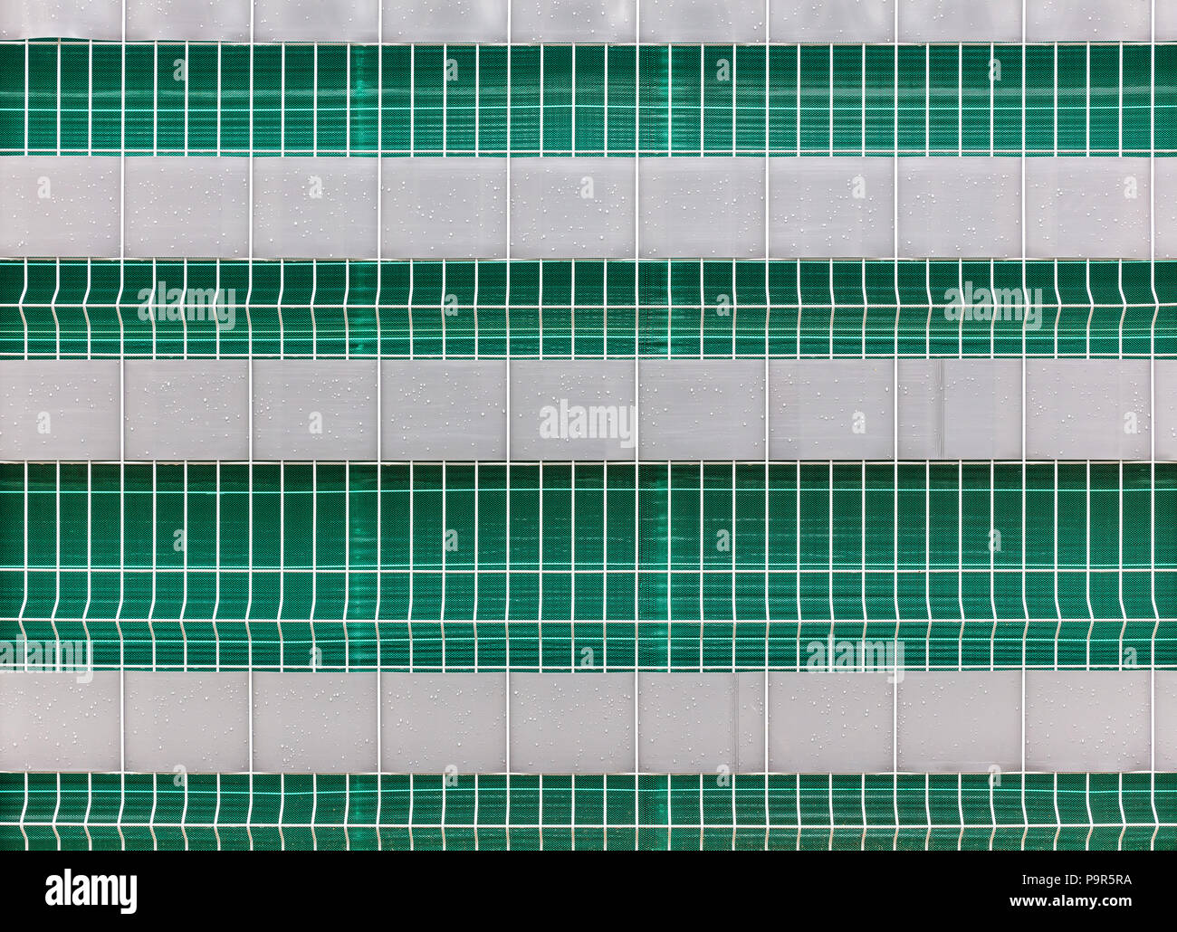 metal wire fence barrier on construction site. industrial background ...