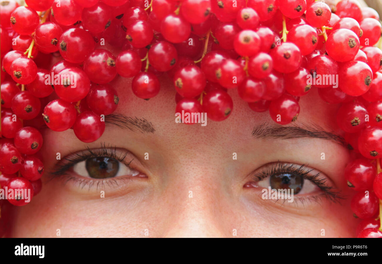 summertime, girl with red berries on her head Stock Photo - Alamy