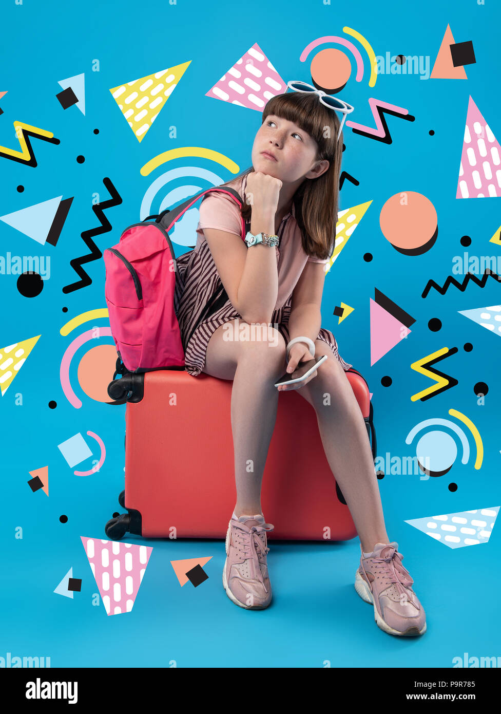 Curious girl waiting for her plane and thinking Stock Photo - Alamy