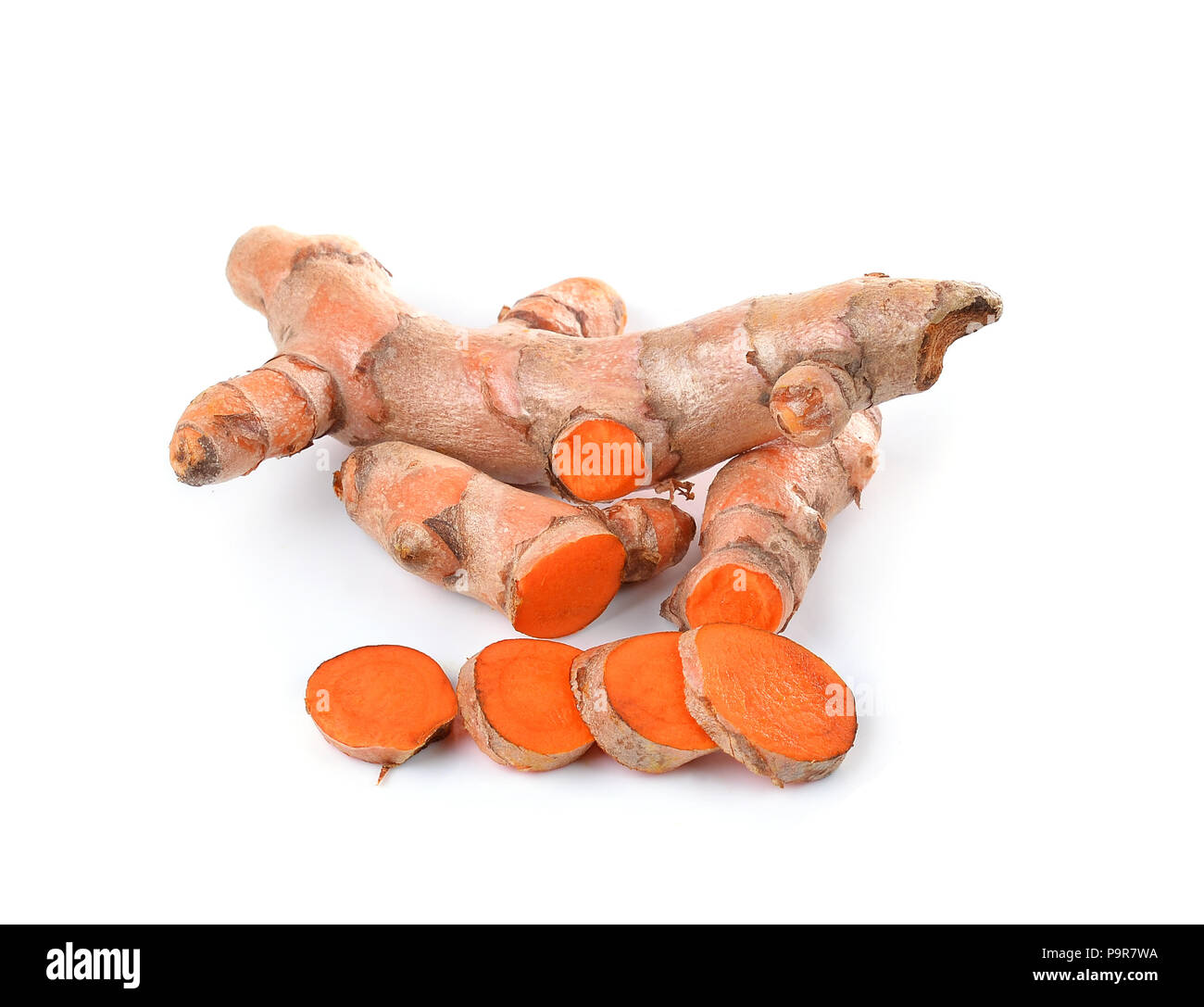 Fresh turmeric isolated on white background Stock Photo - Alamy