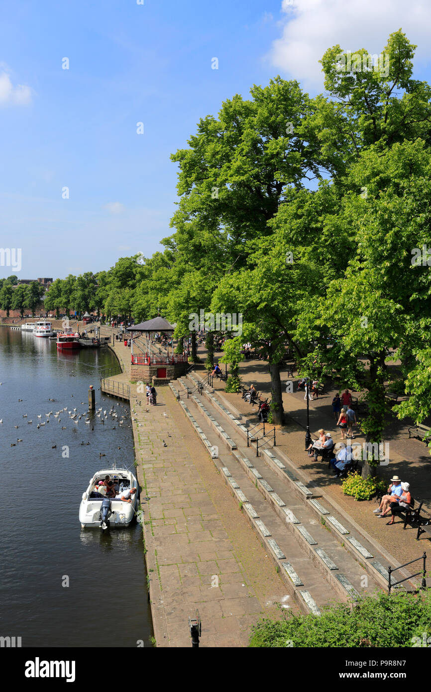 People and boats at the River Dee Embankment, Chester City, Cheshire ...