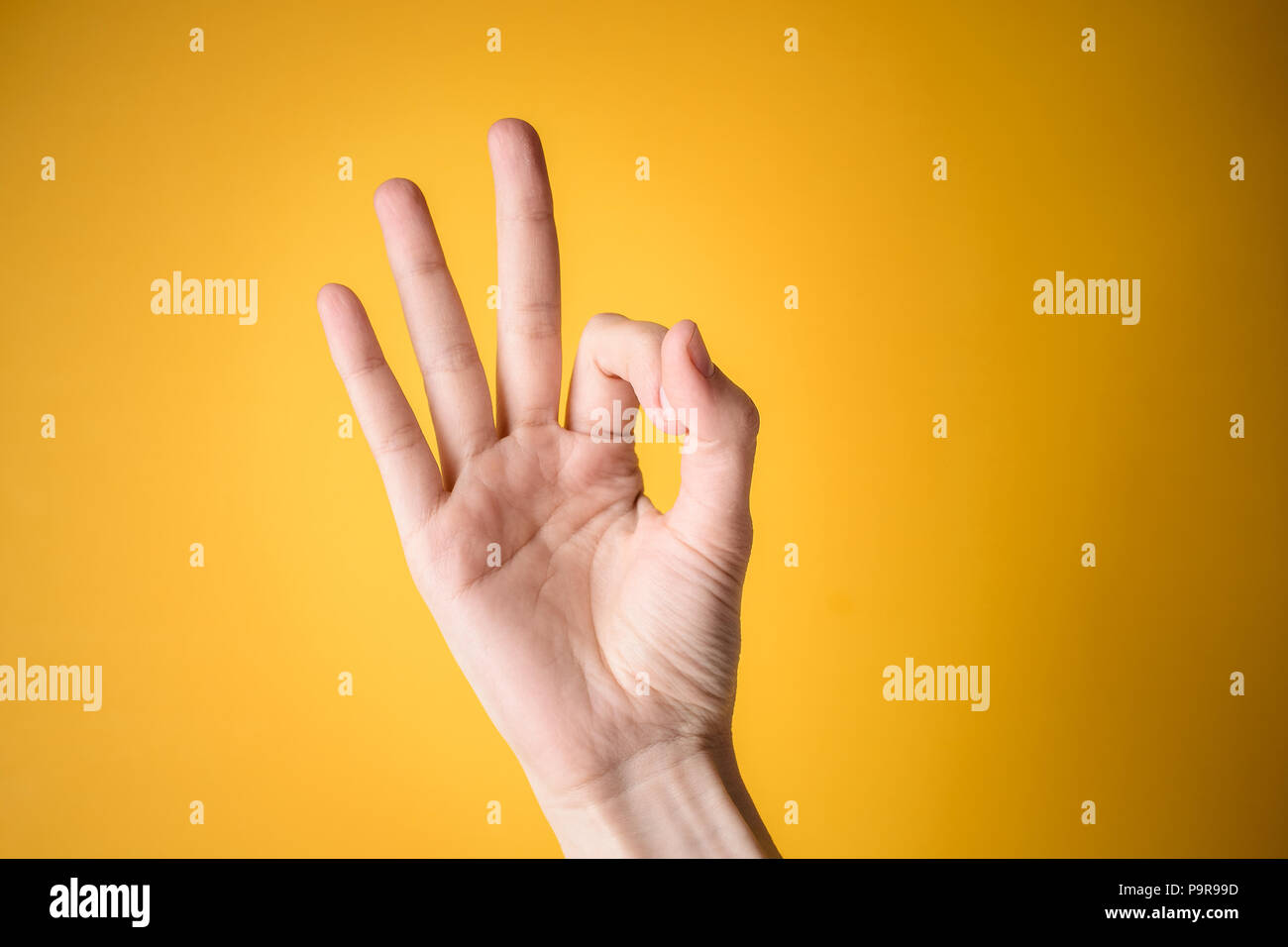 Three Finger Hand Gesture Sign High Resolution Stock Photography and ...