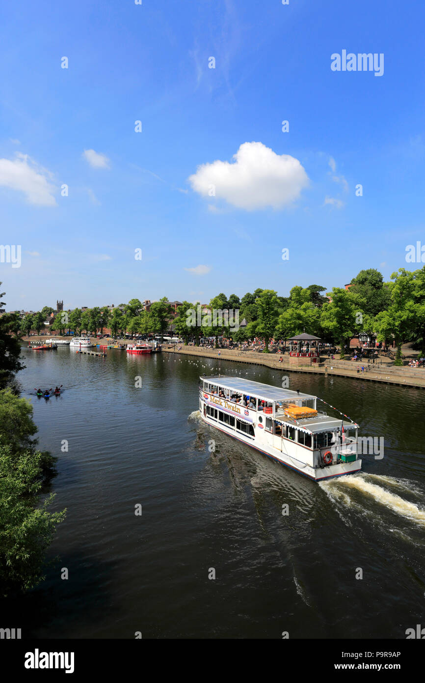 People and boats at the River Dee Embankment, Chester City, Cheshire ...