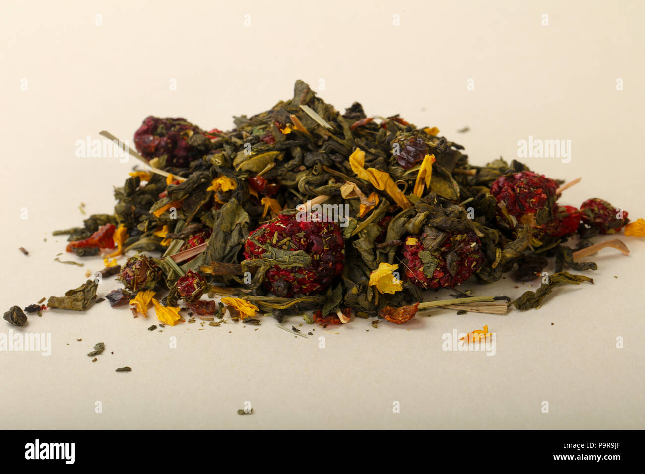 Aroma tea heap with fruit, berries and herbs Stock Photo - Alamy