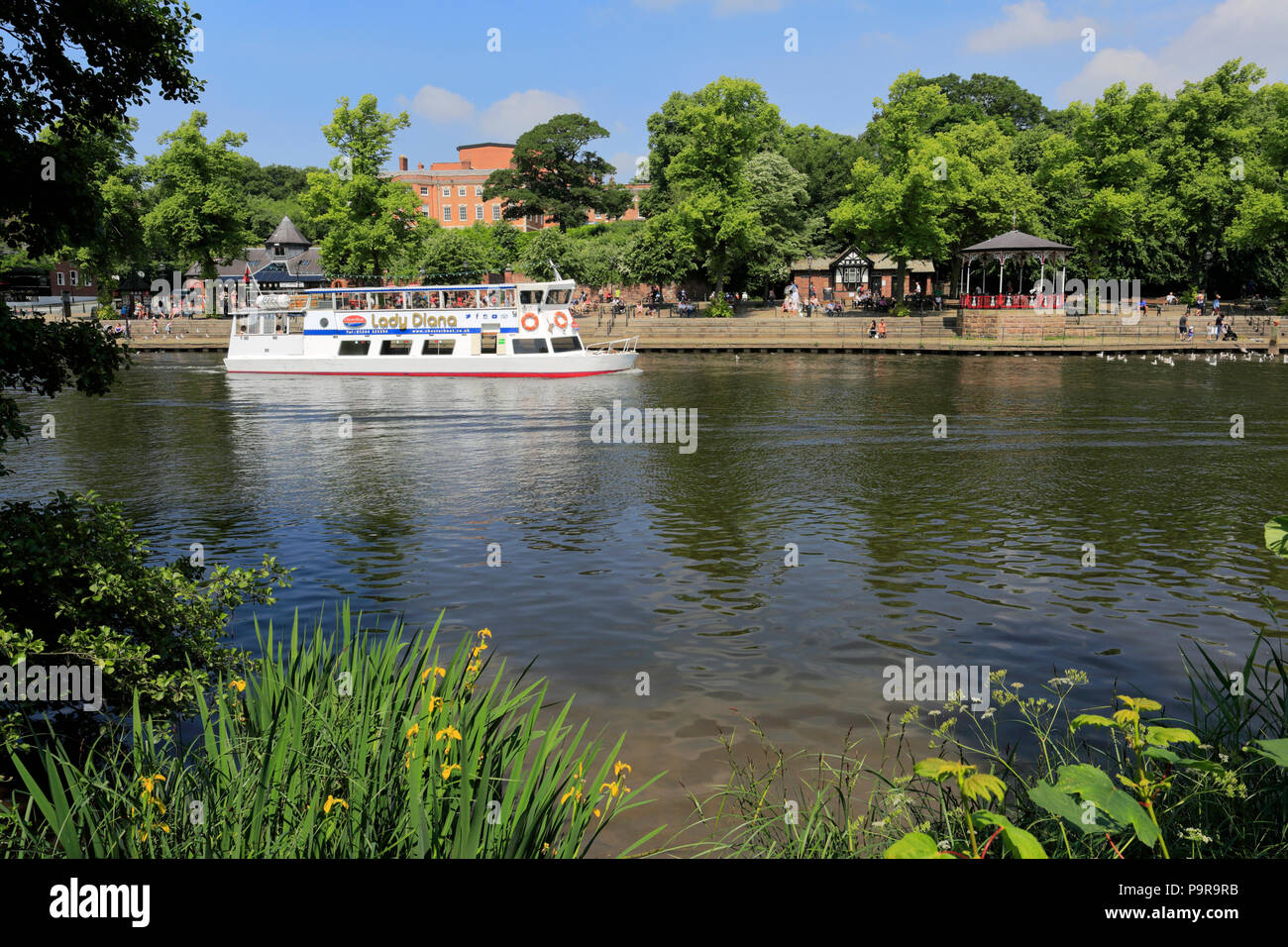 People and boats at the River Dee Embankment, Chester City, Cheshire ...