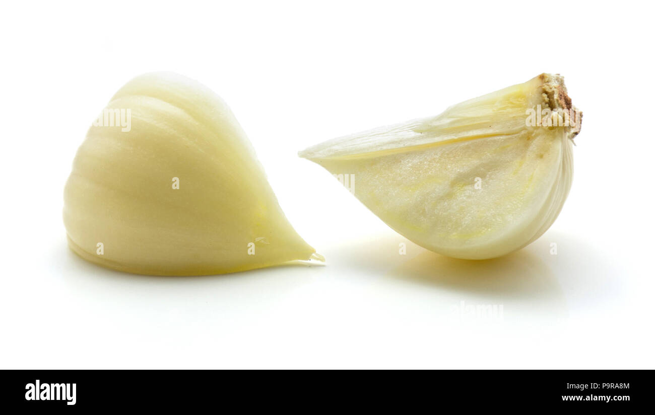Two quarters of solo garlic isolated on white background single clove ...