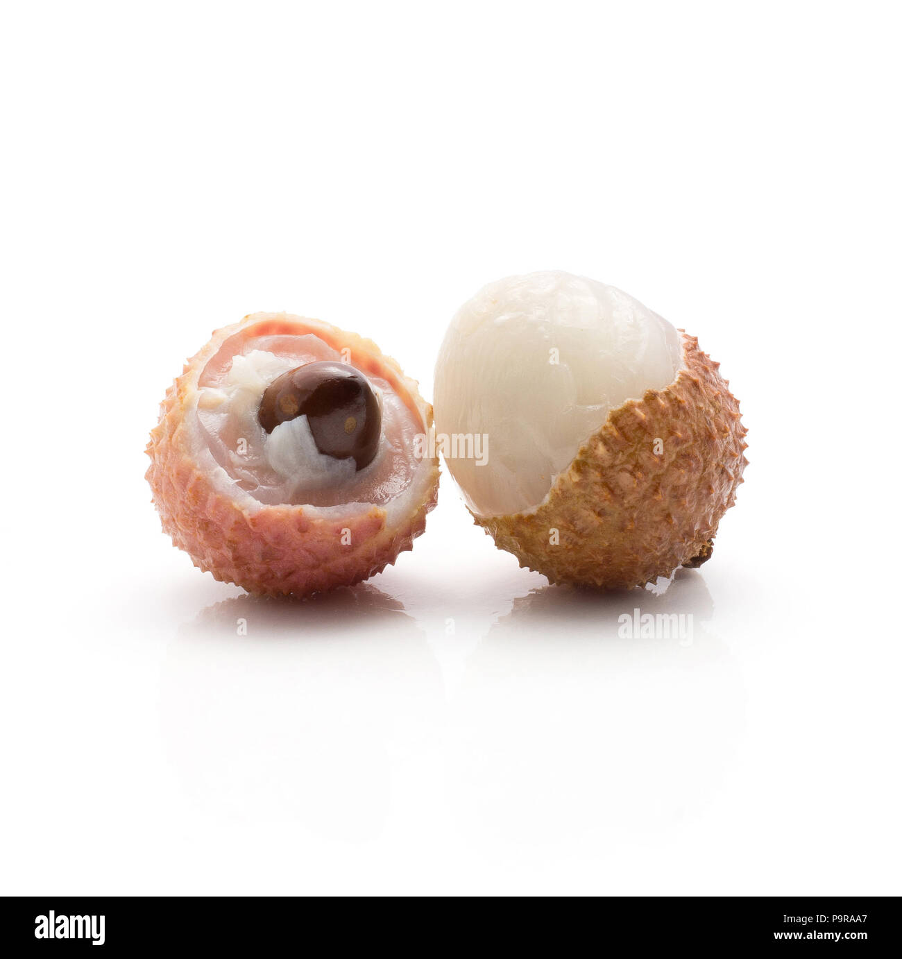 Two peel lychee one with brown seed isolated on white background ripe ...