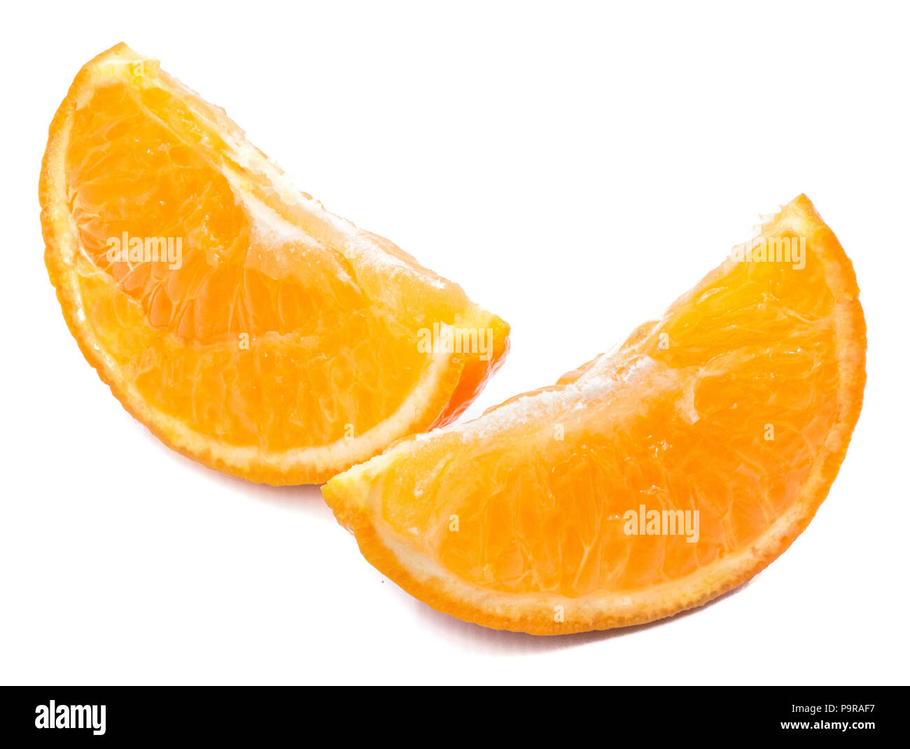 Two Clementine slices isolated on white background Stock Photo - Alamy