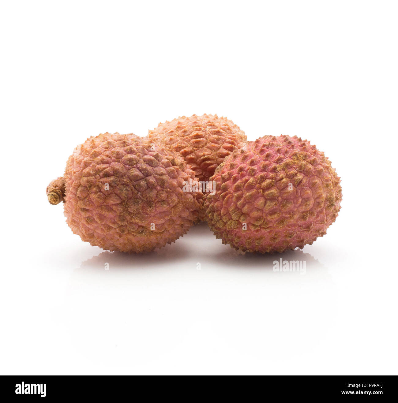 Lychee isolated on white background ripe pink fresh three berries stack ...