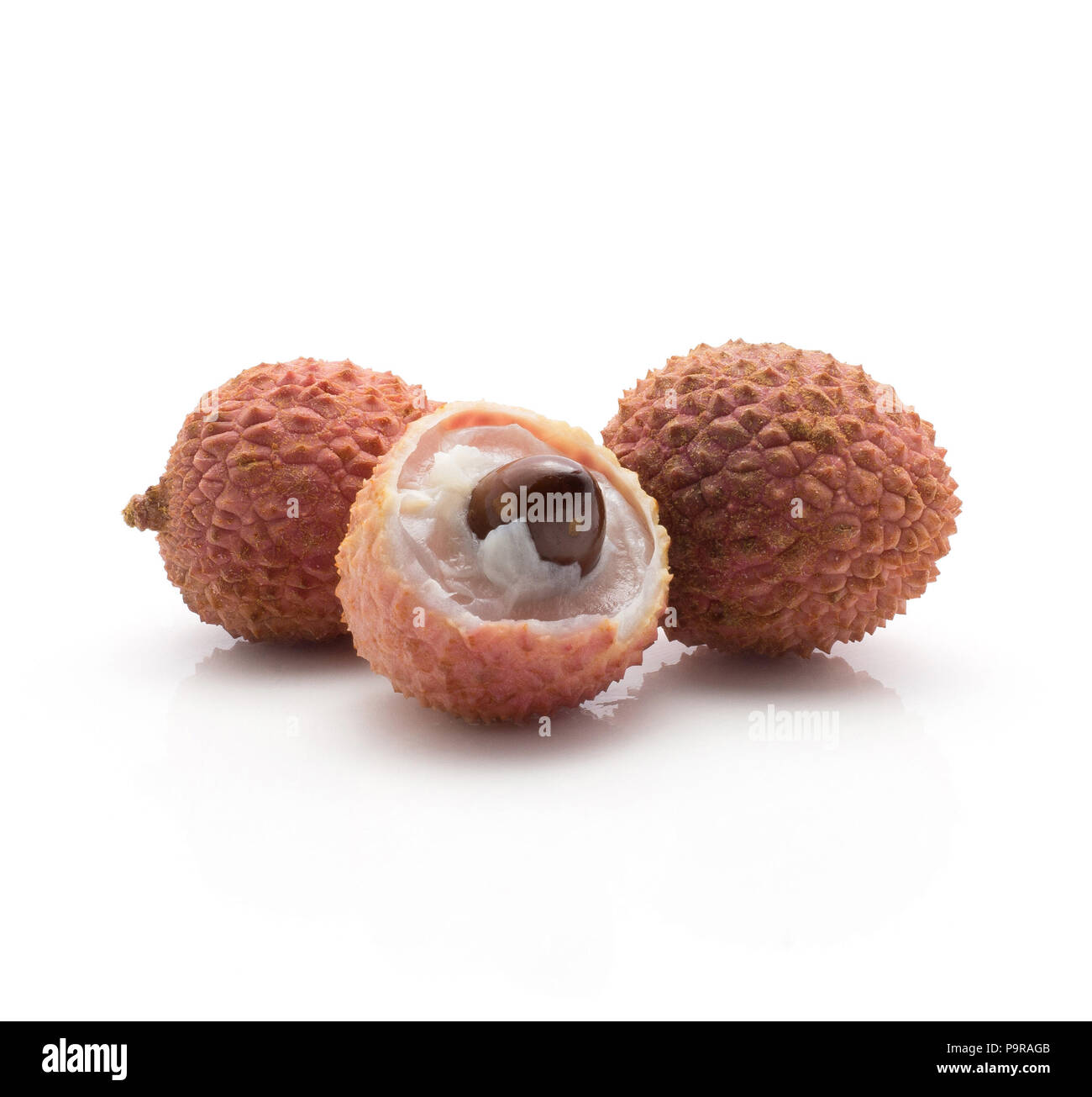 Three peel lychee with brown seed isolated on white background ripe ...
