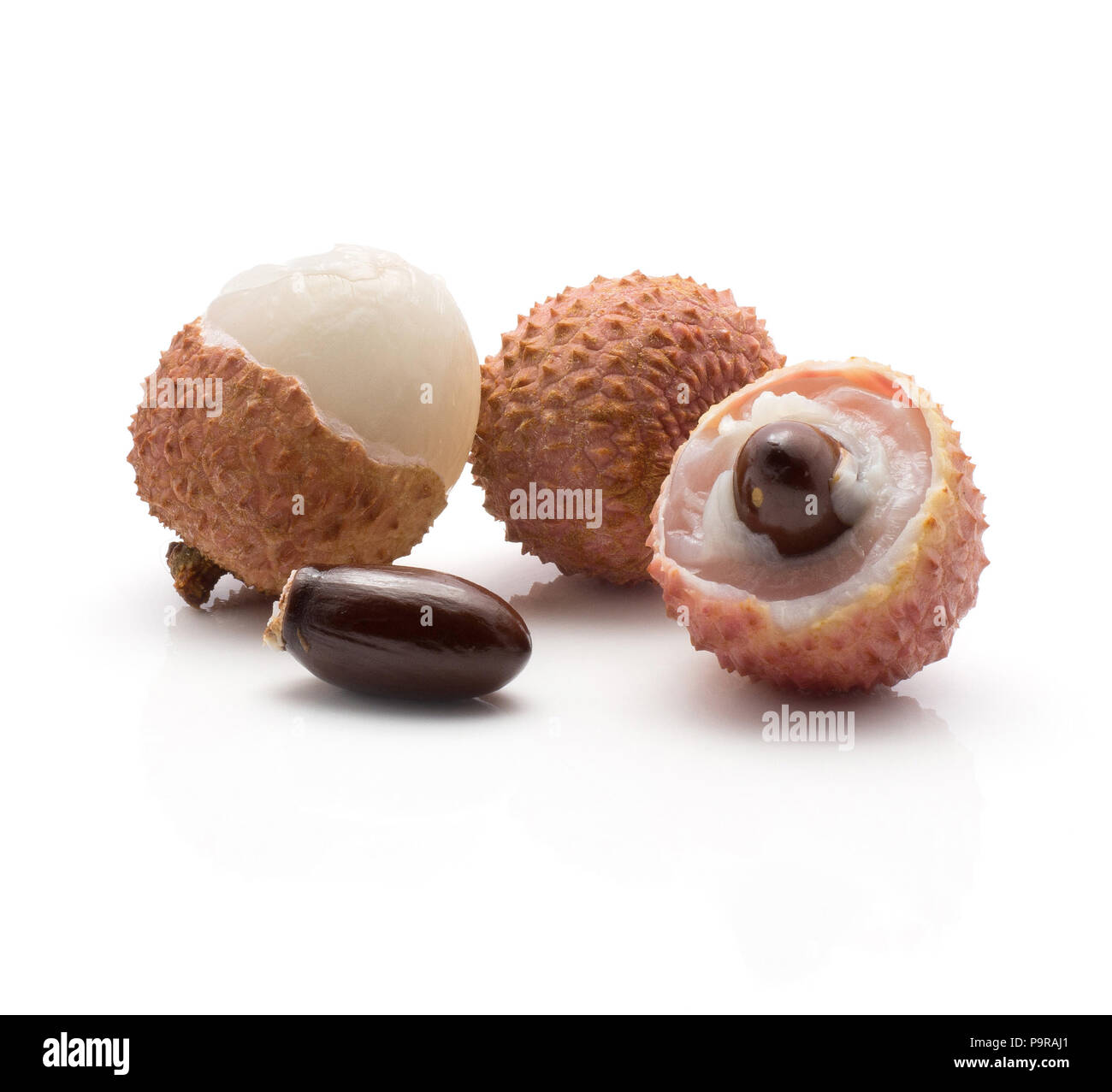 Lychee stack isolated on white background ripe pink fresh three berries ...