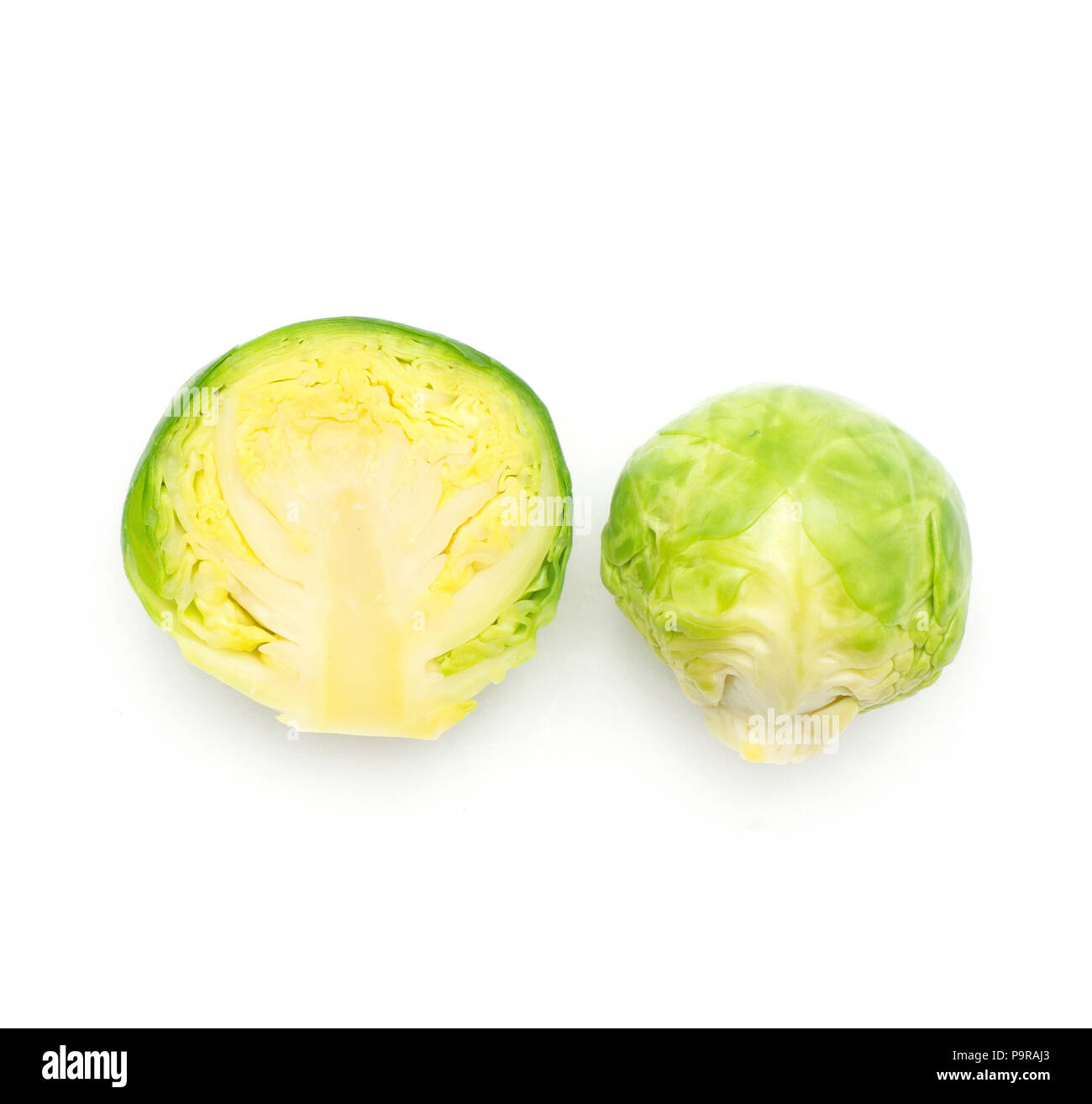 Boiled Brussels sprout one whole compare cross section half top view ...
