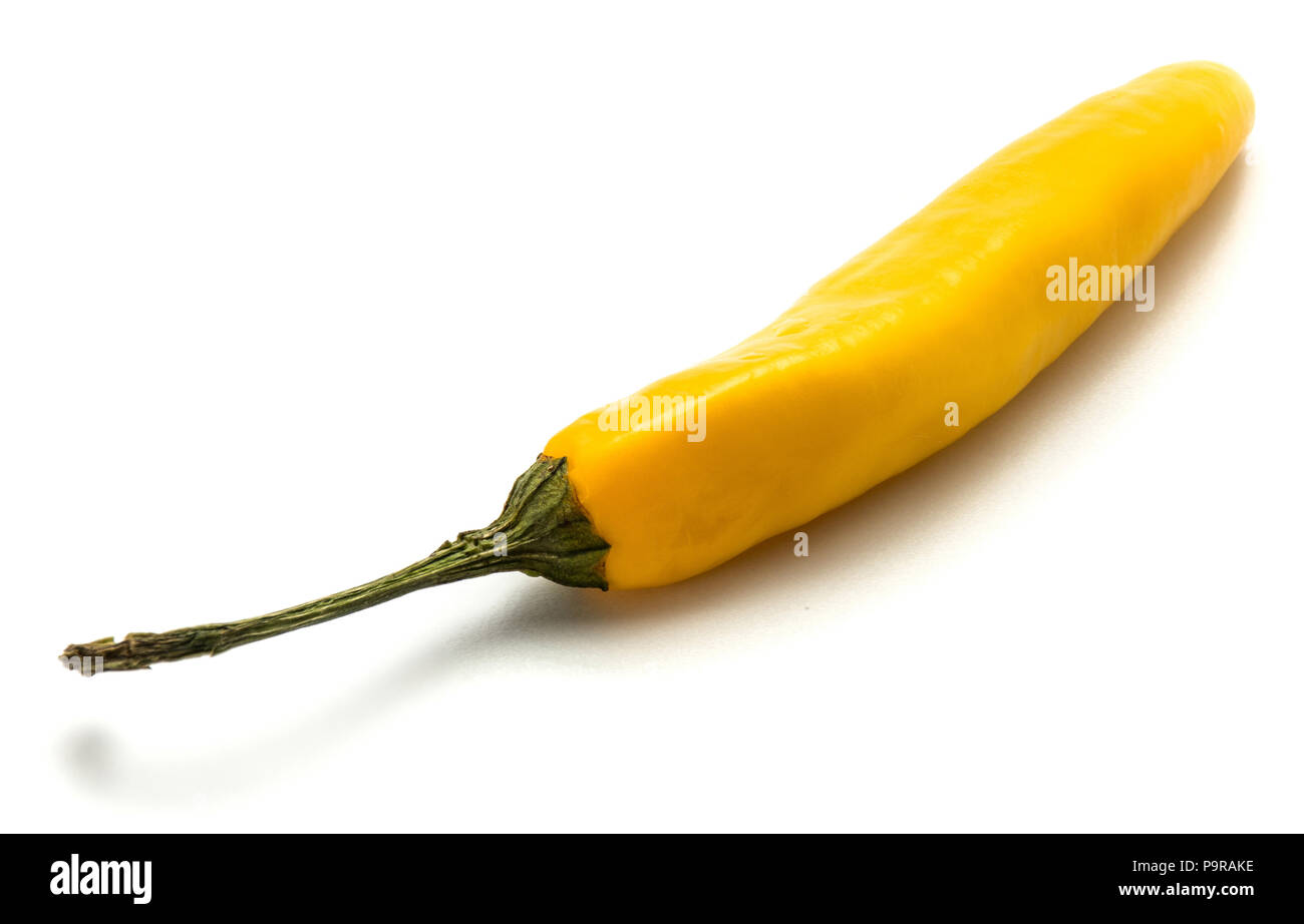 One yellow Chilli isolated on white background Stock Photo - Alamy