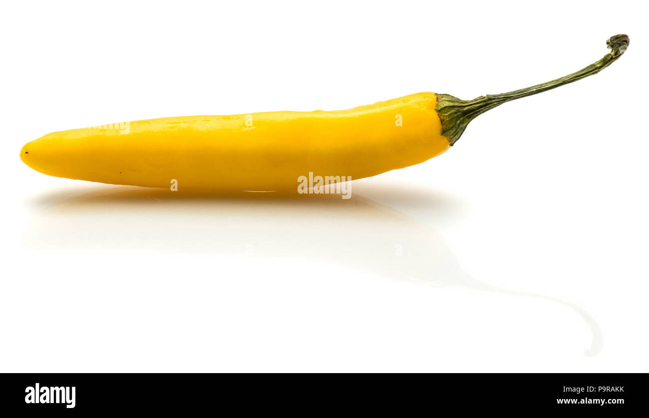 One yellow Chilli isolated on white background Stock Photo - Alamy