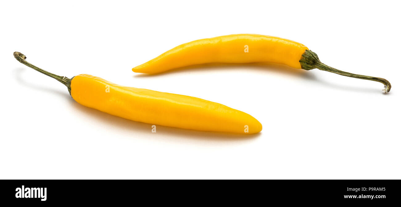 Pair of yellow Chili peppers isolated on white background Stock Photo ...