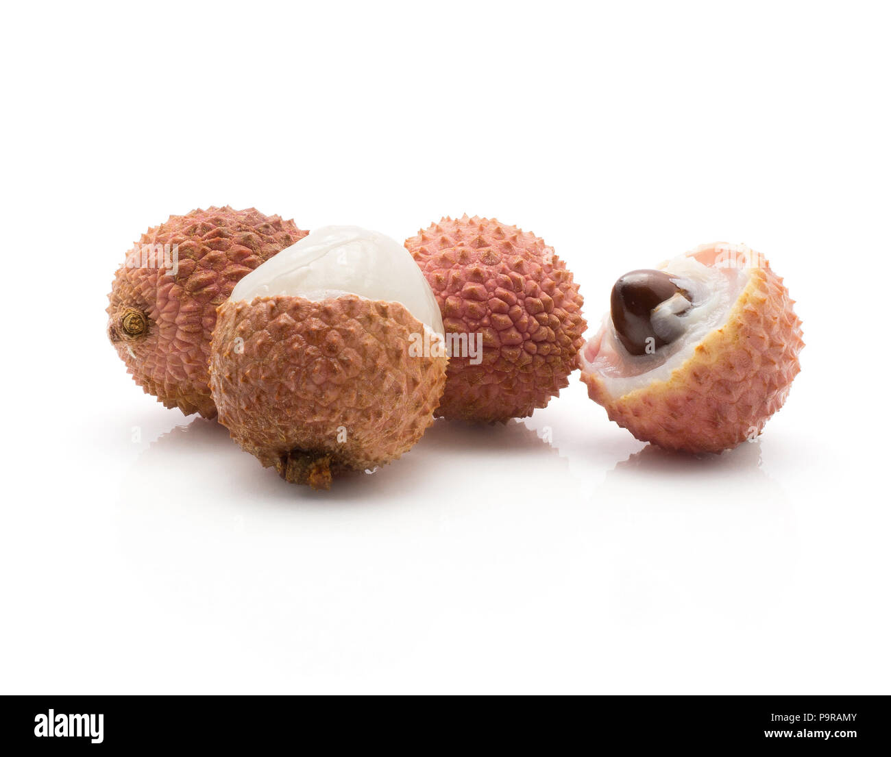 Four lychee isolated on white background ripe pink fresh berries two ...
