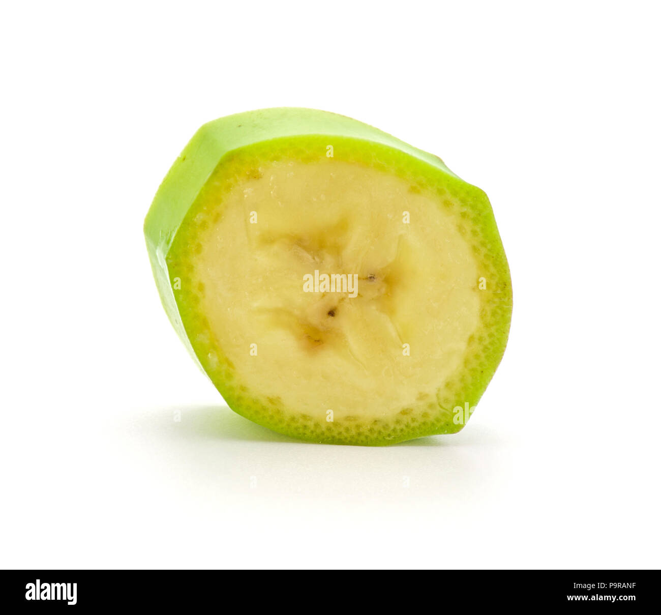 One plantain slice isolated on white background Stock Photo - Alamy