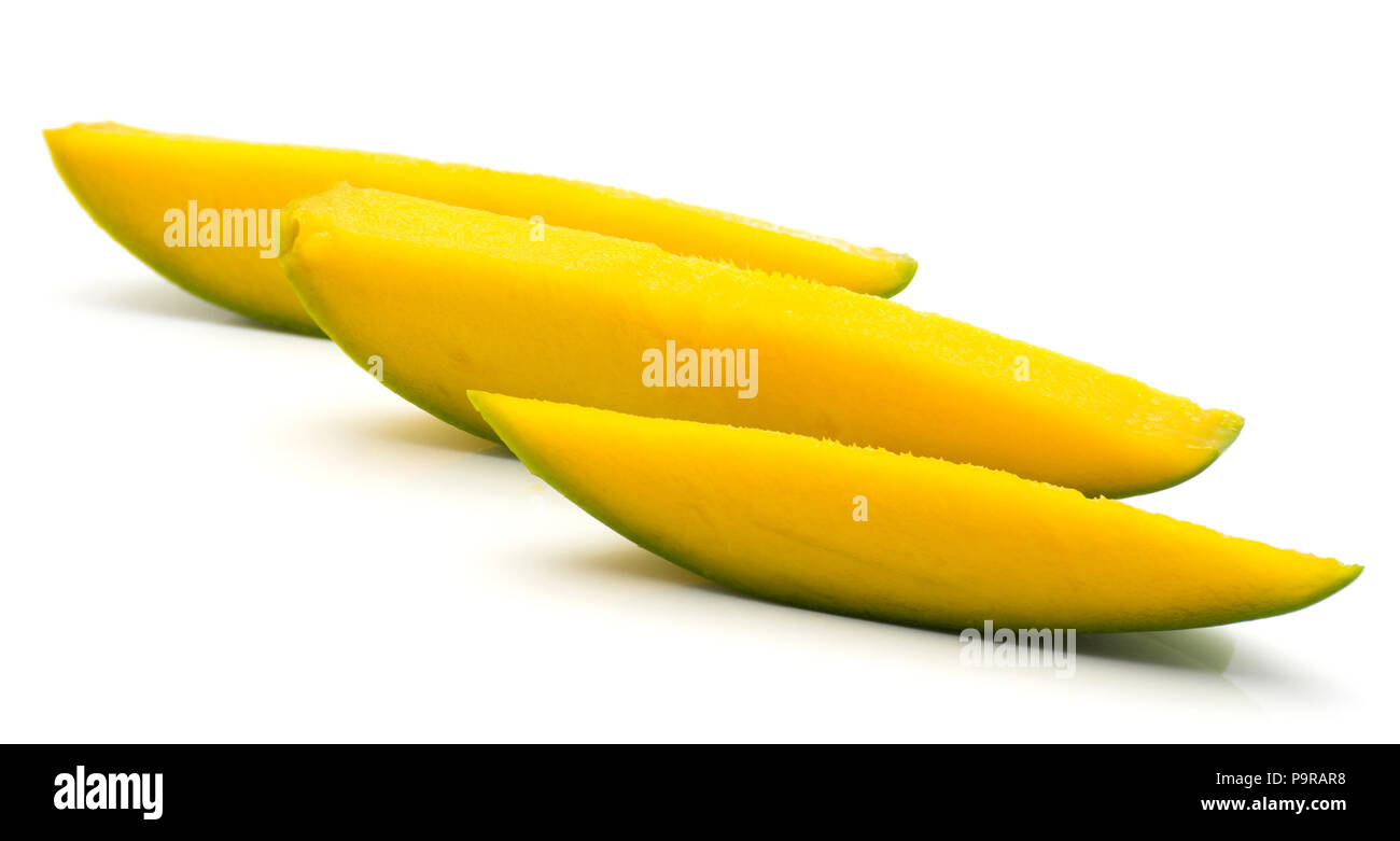 Three mango slices isolated on white background Stock Photo - Alamy