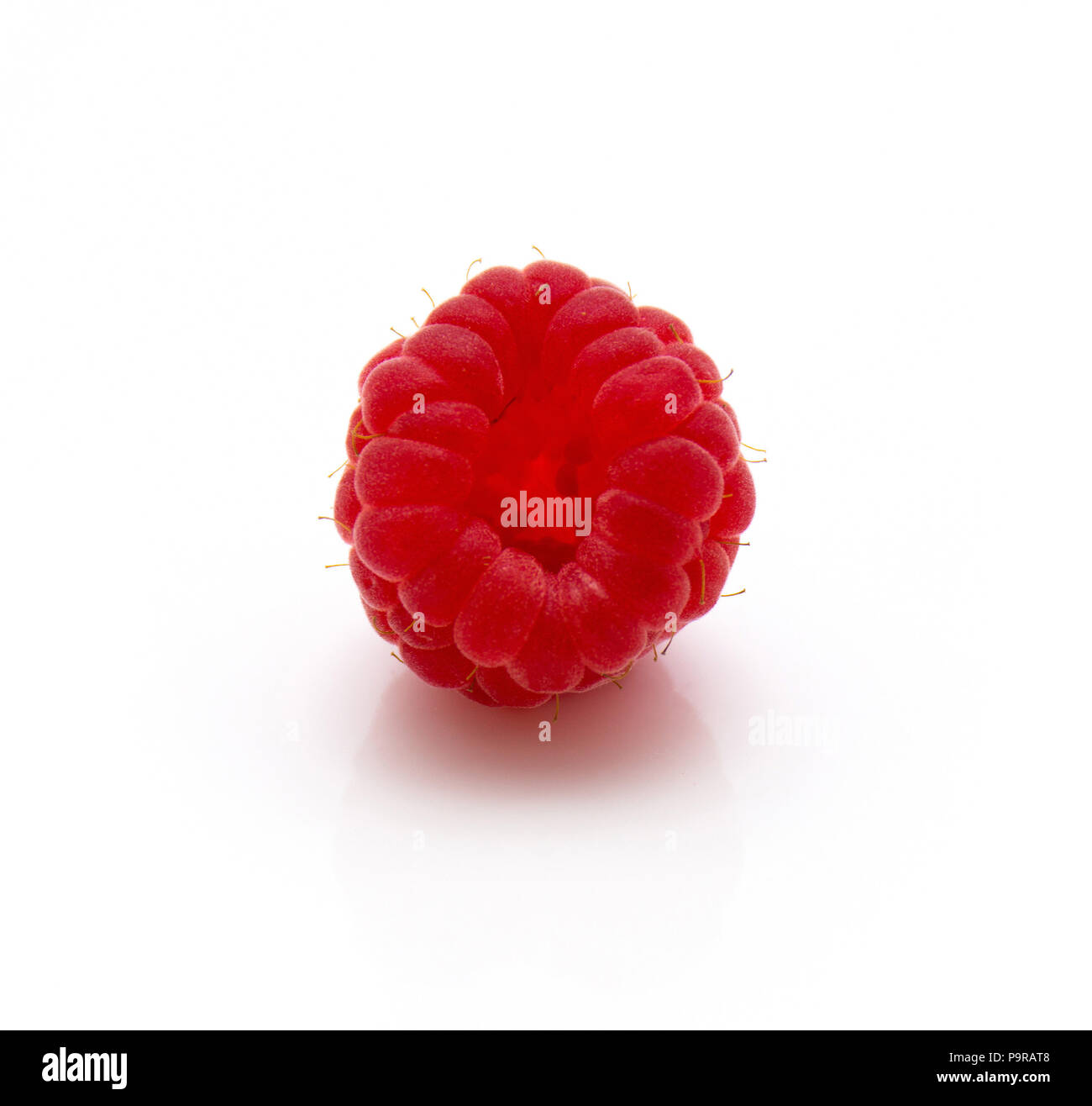 Red raspberry isolated on white background one whole Stock Photo - Alamy