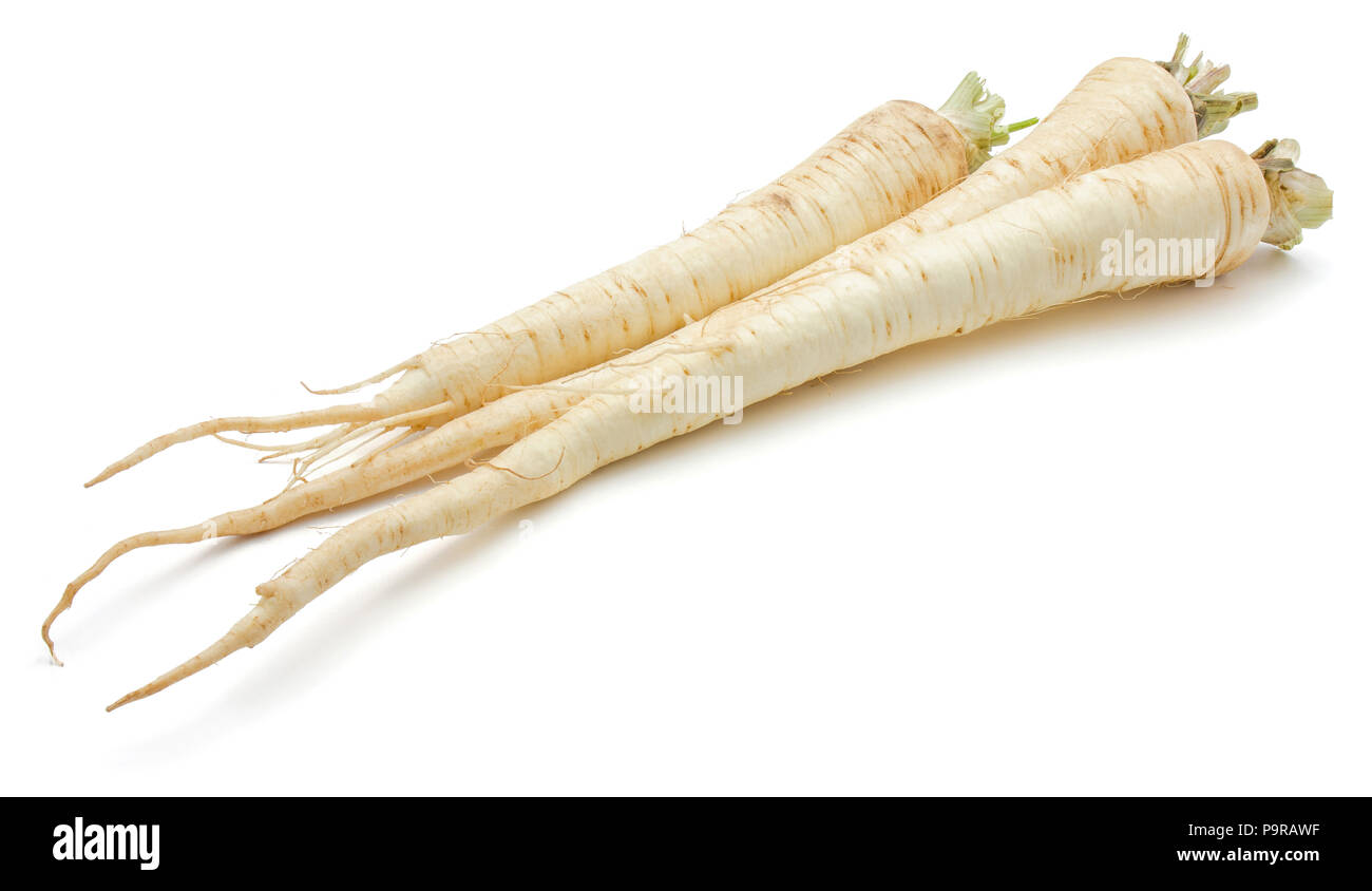 Three fresh parsley root isolated on white background Stock Photo - Alamy