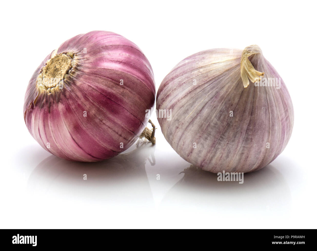 Two single clove solo pearl garlic isolated on white background Stock ...