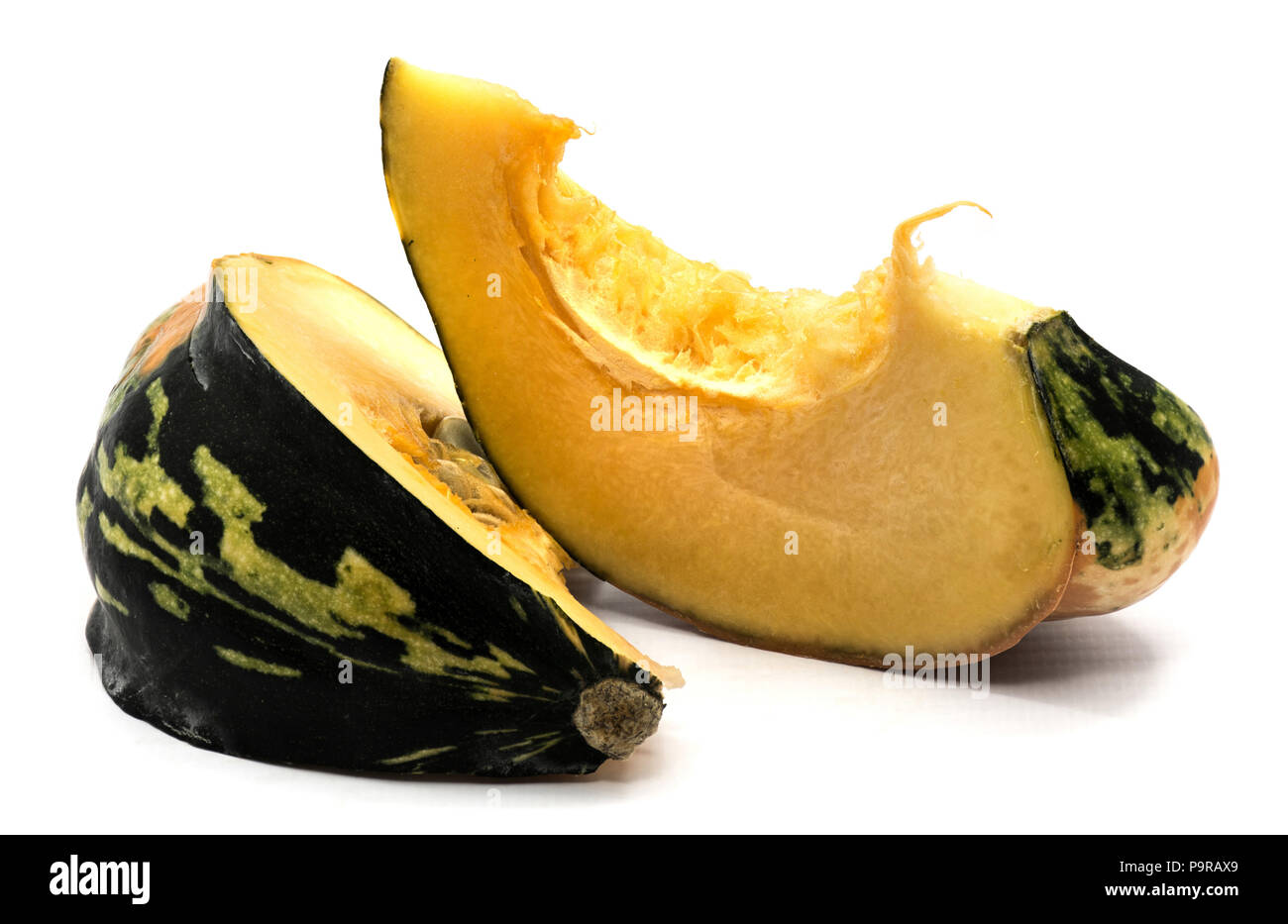 Two spotty green yellow pumpkin slices with seeds isolated on white ...