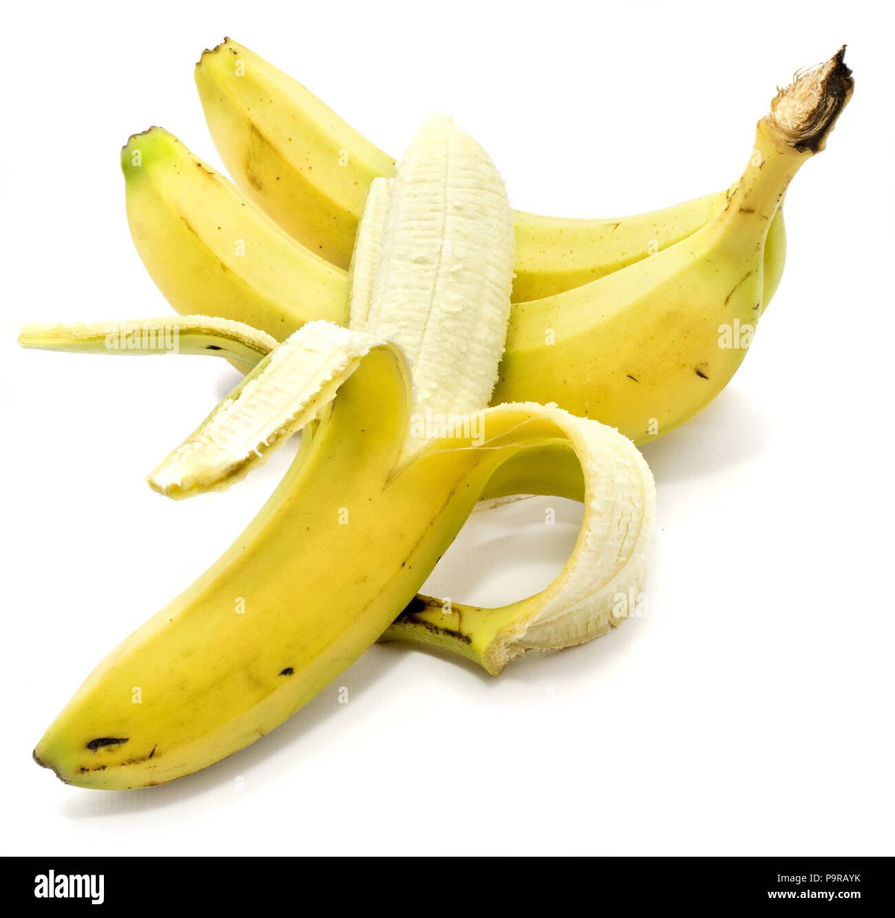 Two whole bananas, one open, isolated on white background Stock Photo ...