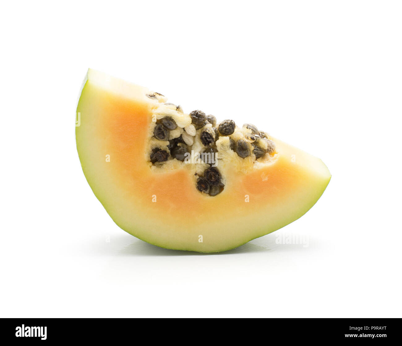 One green papaya slice (pawpaw, papaw) isolated on white background ...