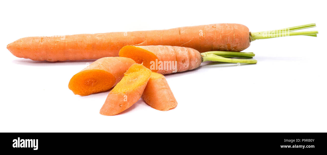 One whole fresh long orange carrot and its slices isolated on white ...