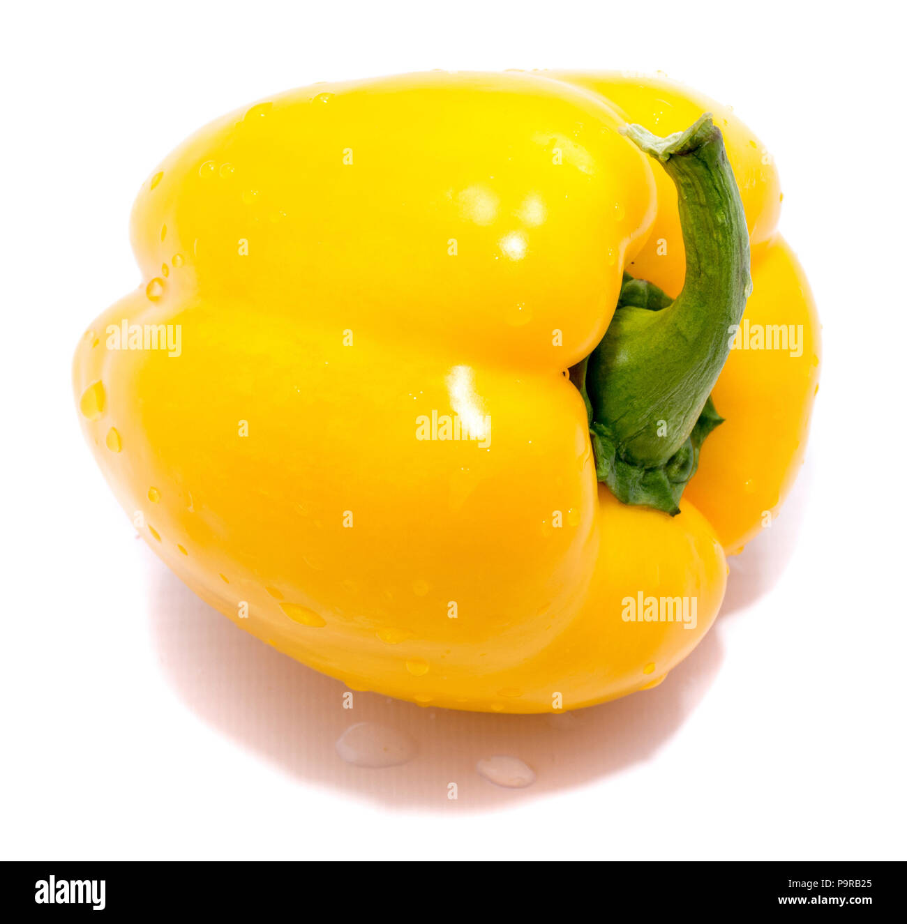 One yellow pepper on back, isolated on white background Stock Photo - Alamy