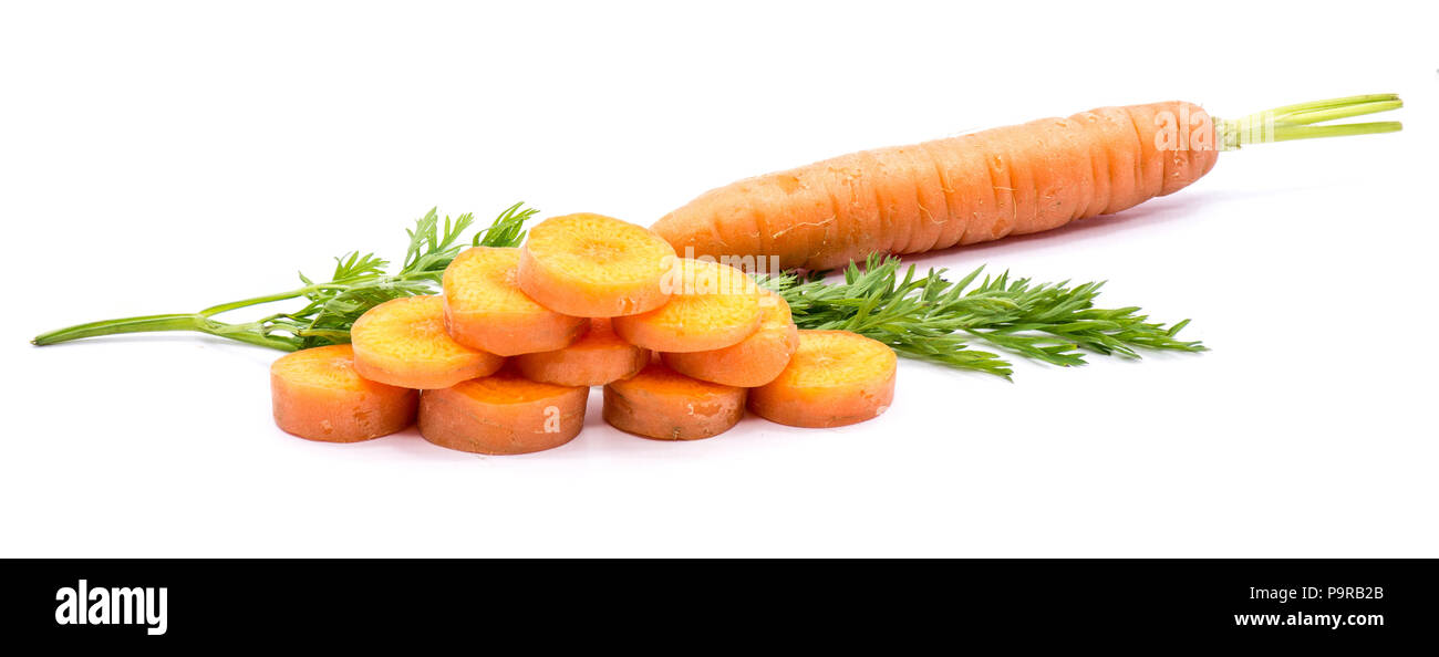 Group of sliced round orange carrot circles in the shape of pyramid ...