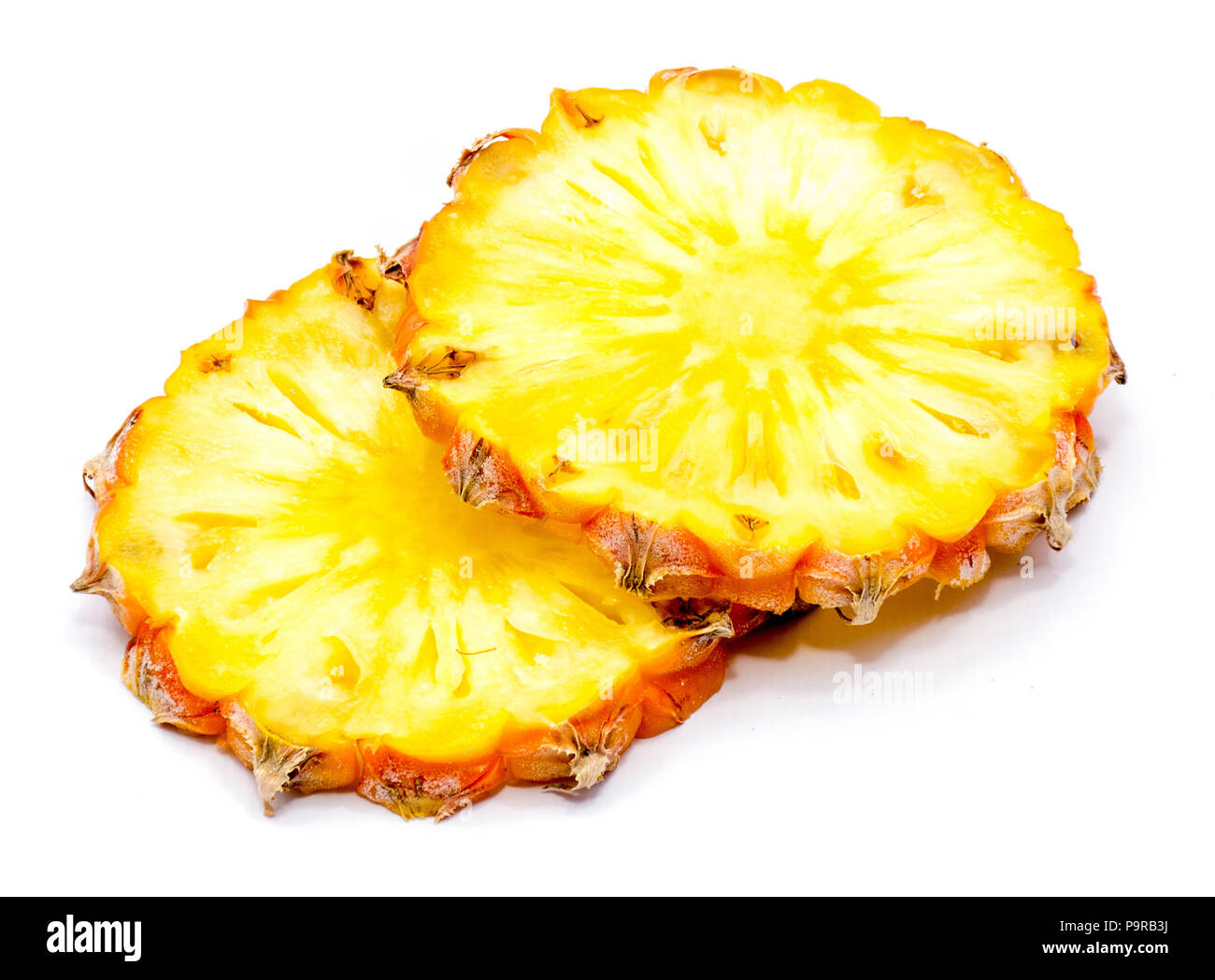 Two fresh round pineapple slices isolated on white background Stock ...