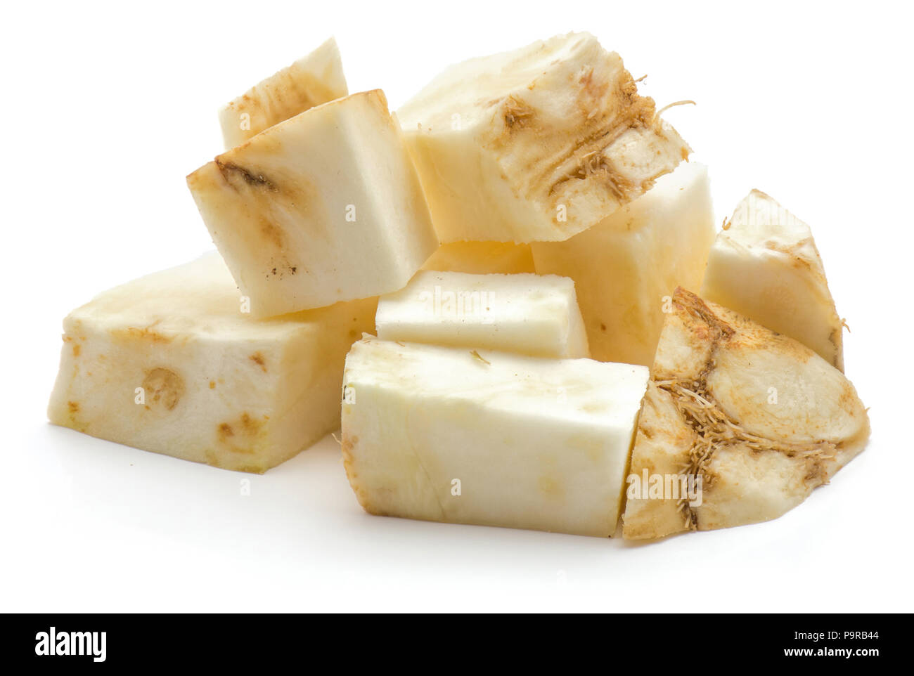 Sliced celery root pieces isolated on white background Stock Photo - Alamy