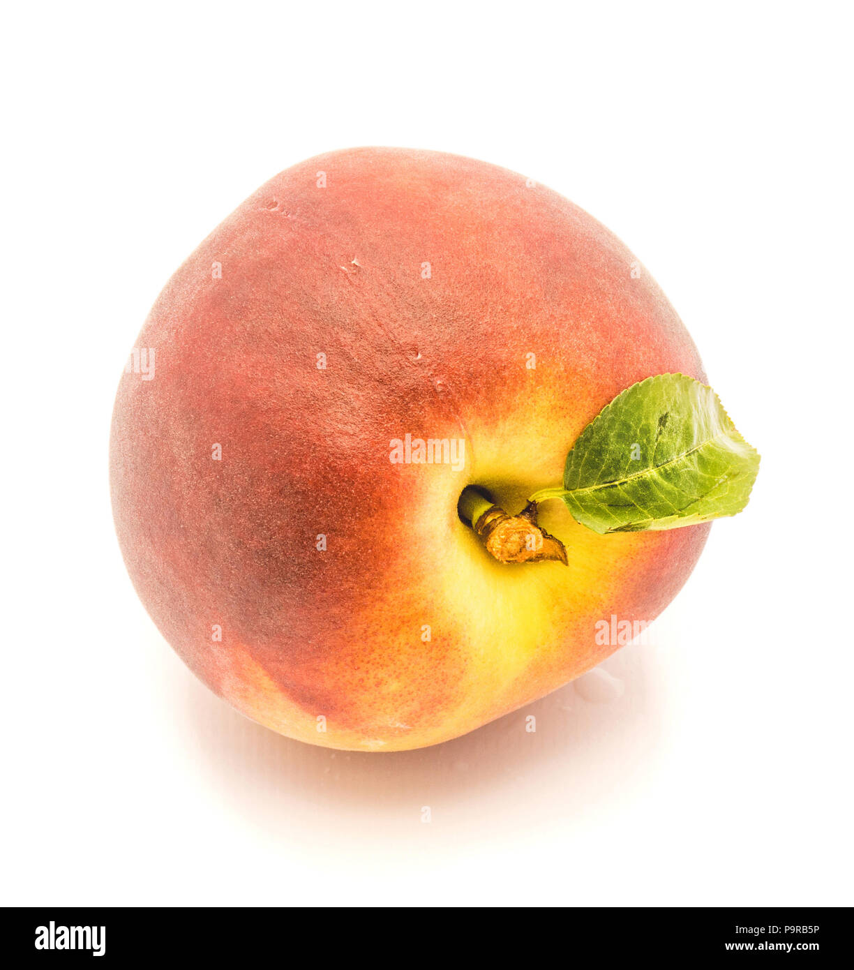 Peach, one whole with green leaf, isolated on white background Stock ...