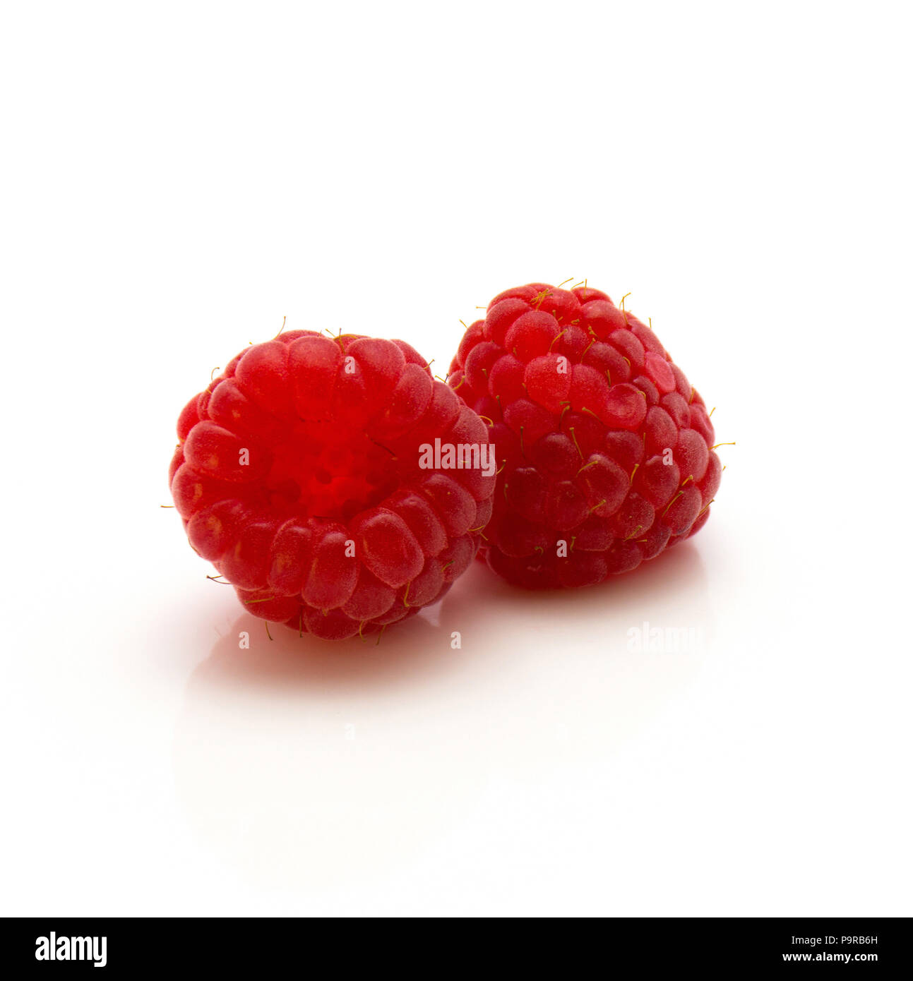 Red raspberry isolated on white background two whole and fresh Stock ...