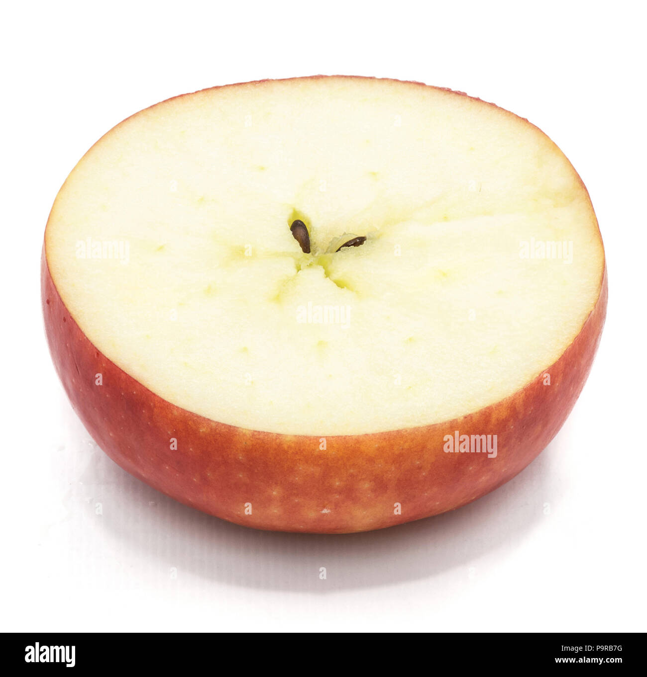 One Kanzi apple cross section half isolated on white backgound Stock ...